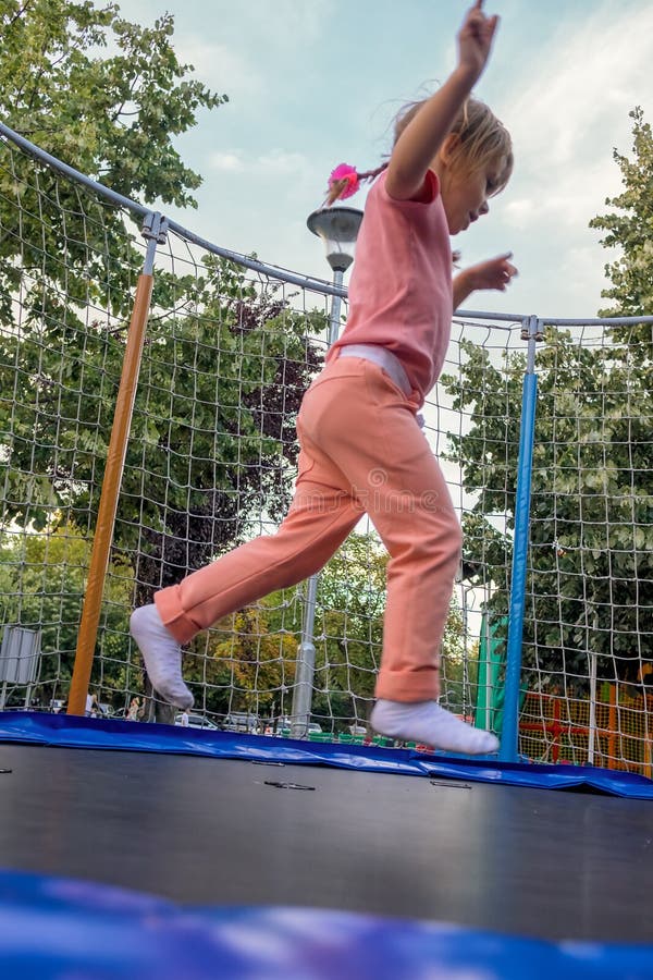 Fun on trampoline stock image. Image of play, cute, young - 189058745