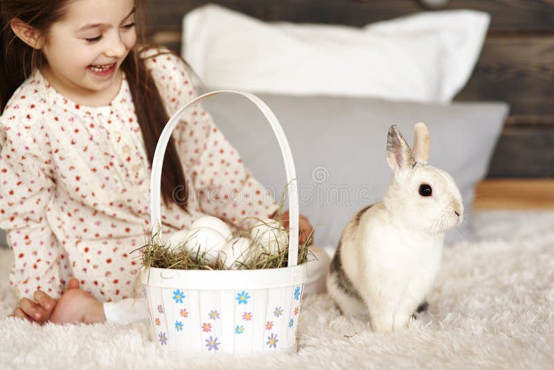 Girl Having Fun with Rabbit in Bedroom Stock Image - Image of smile ...