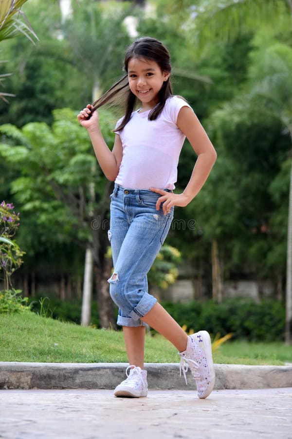 Girl Having Fun Standing stock photo. Image of upright - 137563318