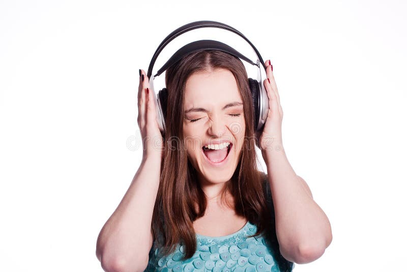 Girl with Headphones Singing on White Background Stock Photo - Image of ...