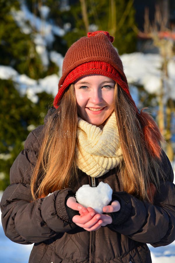 Girl Heart of Snow stock photo. Image of portrait, snowball - 49993996