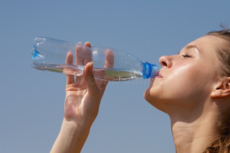 Girl dinking water stock image. Image of blue, gulp, lifestyle - 2608025
