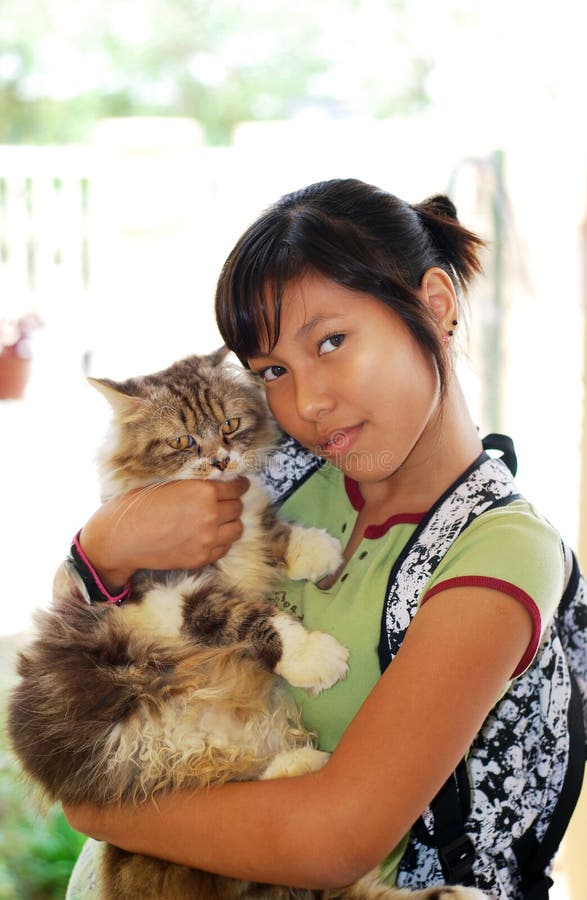 Girl with her cat stock image. Image of whiskers, feline - 1977217