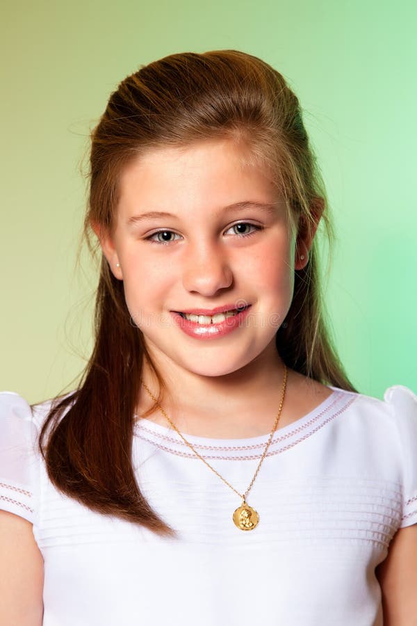 VILLANOVA, PA - MAY 14: Young Girl Dressed Up Receiving Her Firs Stock ...