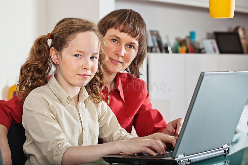 Girl and Her Mother with Laptop at Home Stock Image - Image of scholar ...