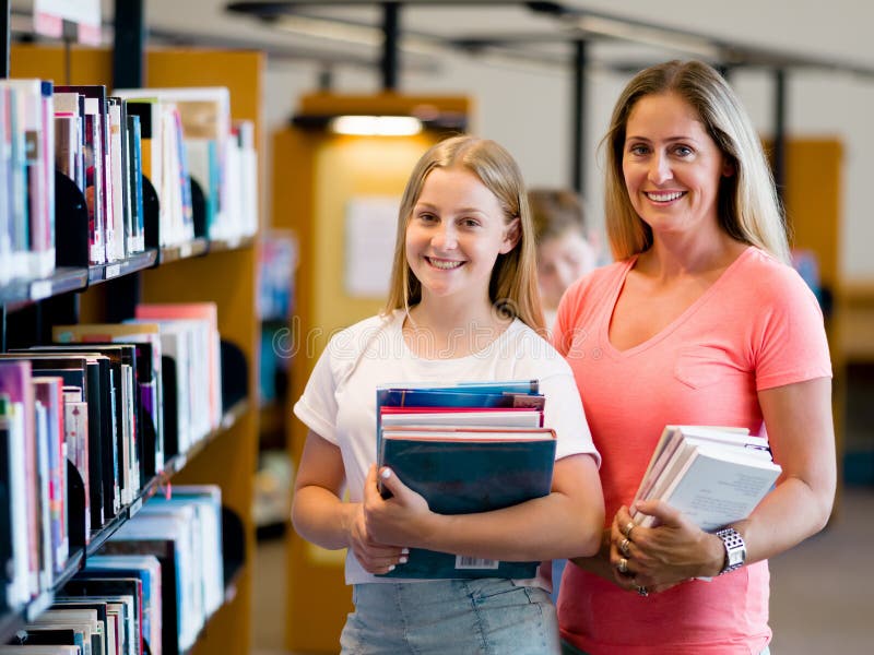 Girl and Her Mother in Library Stock Photo - Image of caucasian ...
