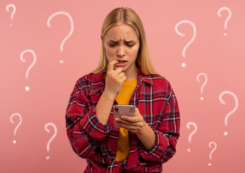 Girl with Her Smartphone. Scared and Afraid Expression Stock Photo ...
