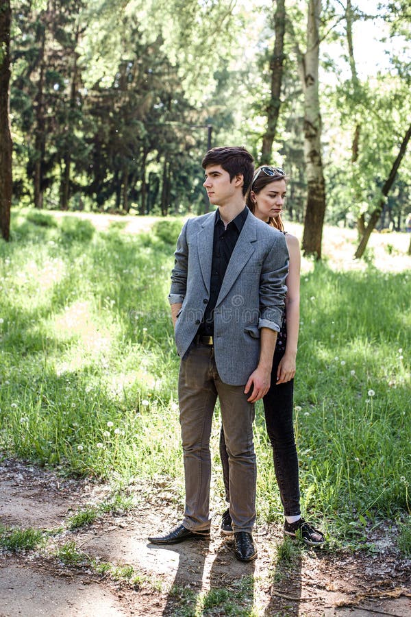 The Girl Hid Behind the Guy S Back. a Concept Protected by a Man Stock ...