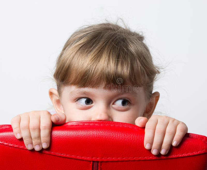 Child Hiding Behind Chair Stock Photos - Free & Royalty-Free Stock ...