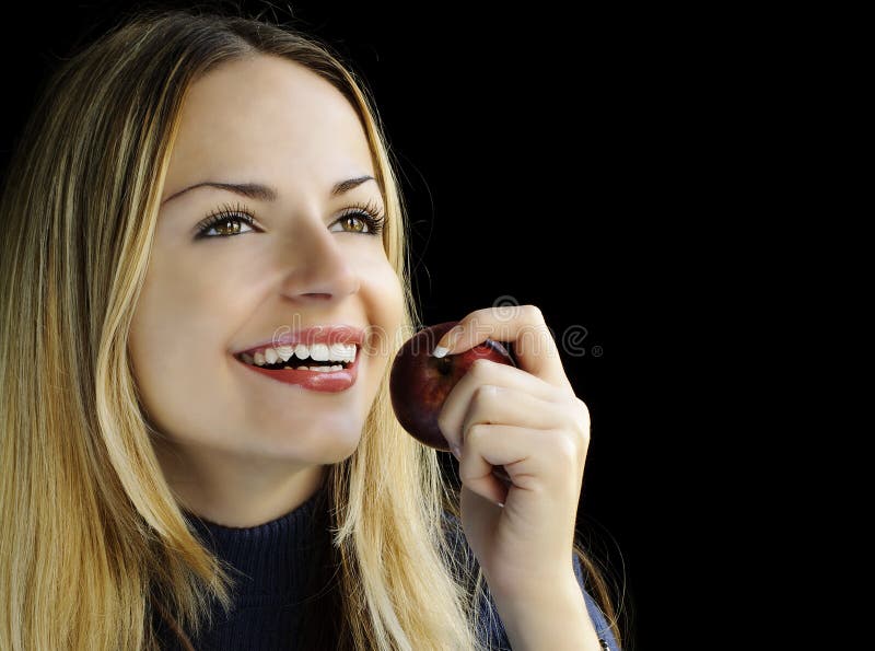Girl holding an apple stock photo. Image of appetite - 16434634