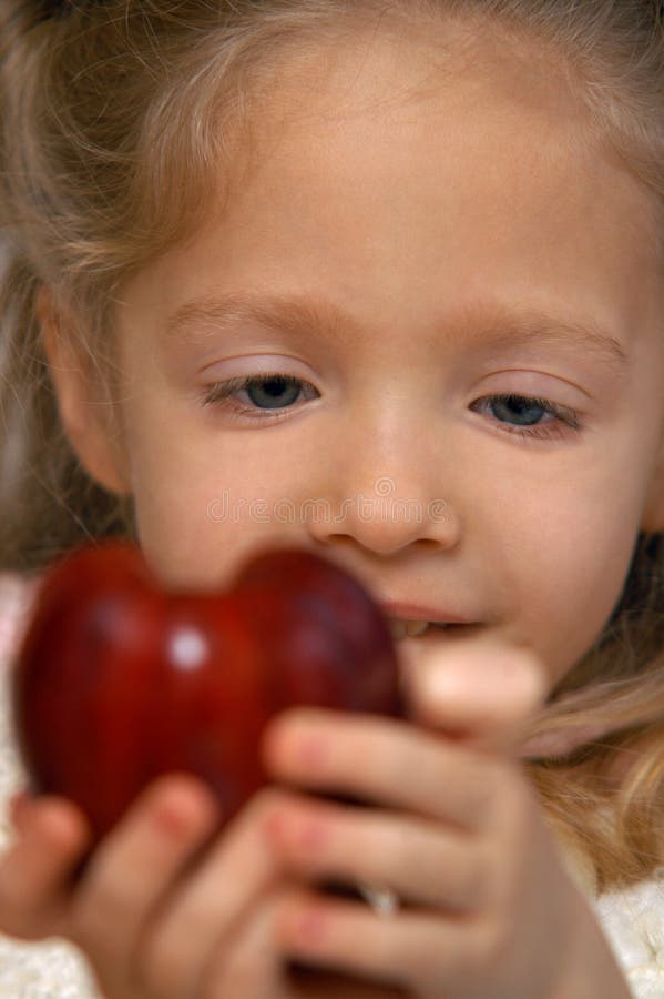 Girl Holding Apple Picture. Image: 8789568