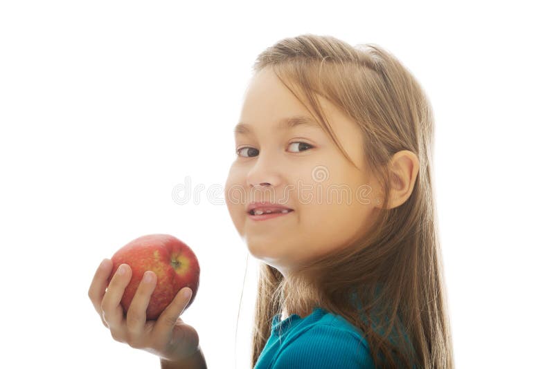 Girl holding an apple stock photo. Image of isolated - 45804236