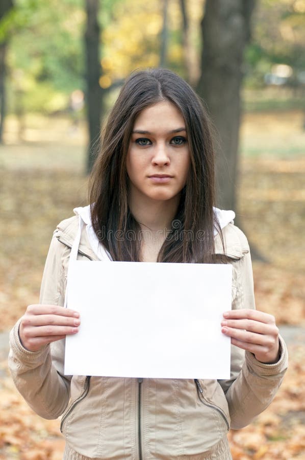 470+ Girl holding blank paper Free Stock Photos - StockFreeImages