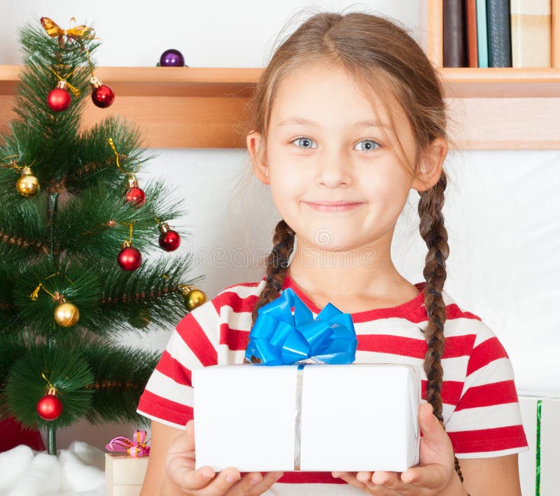 Girl Holding a Box with a Blue Bow Stock Image - Image of present ...
