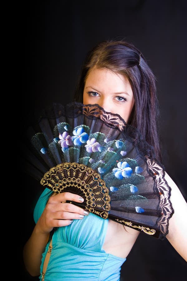 Girl holding a fan stock photo. Image of girl, hiding - 5448290
