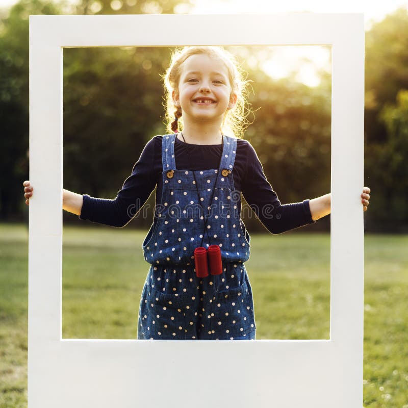 150+ Girl holding frame Free Stock Photos - StockFreeImages