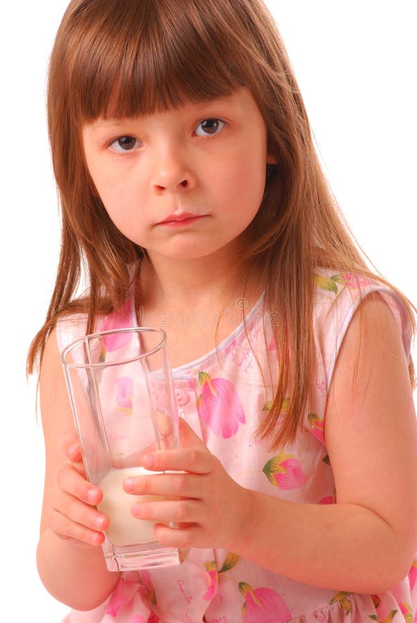 Girl holding glass of milk stock photo. Image of milk - 2189968