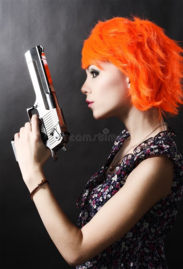 Girl holding gun stock photo. Image of teenager, sensuality - 27445224