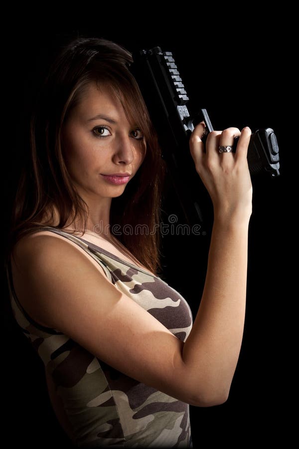 Girl with gun stock image. Image of black, isolated, female - 17439839