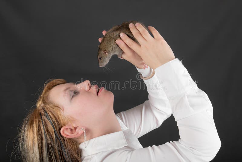 Girl holding a pet rat stock photo. Image of person, face - 62995416