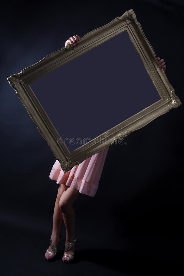 Girl holding a photo frame stock image. Image of frame - 15261297