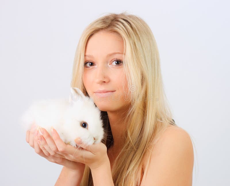 Girl holding a rabbit stock photo. Image of human, hair - 12968856
