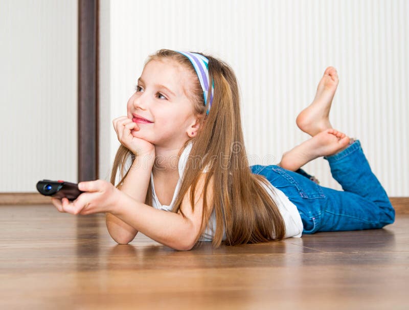Girl Holding a Remote Control Stock Image - Image of lifestyles ...