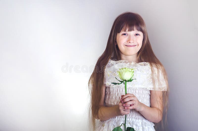 Girl holding a rose stock photo. Image of pretty, eyes - 52773674