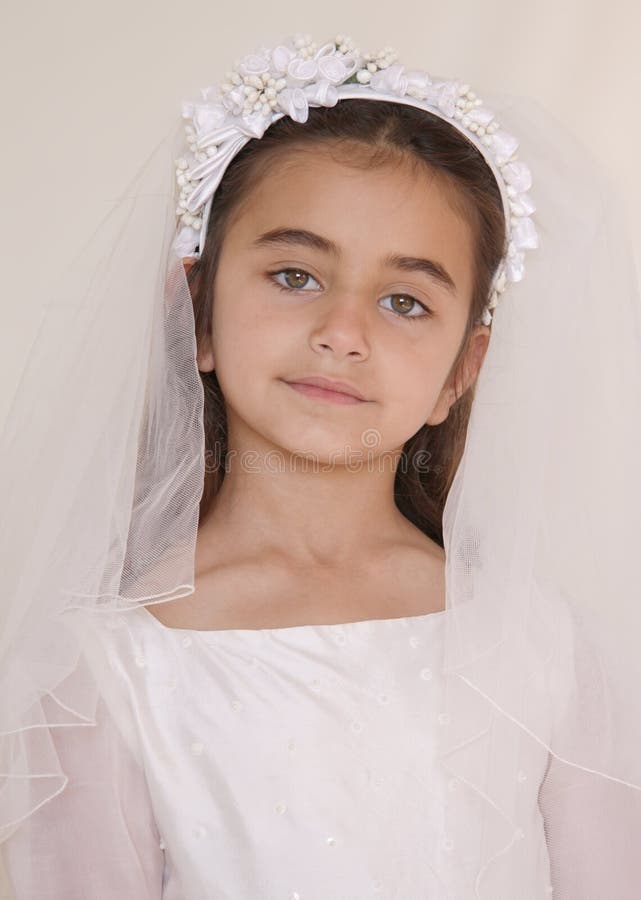 Girl in Her First Communion Dress and Veil Stock Photo - Image of ...