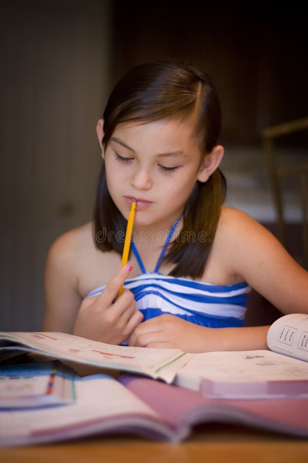 Girl with homework stock image. Image of study, expression - 5774179