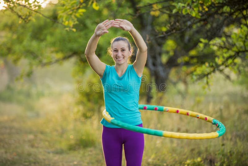 Girl with hoop stock image. Image of nature, happy, park - 59282599