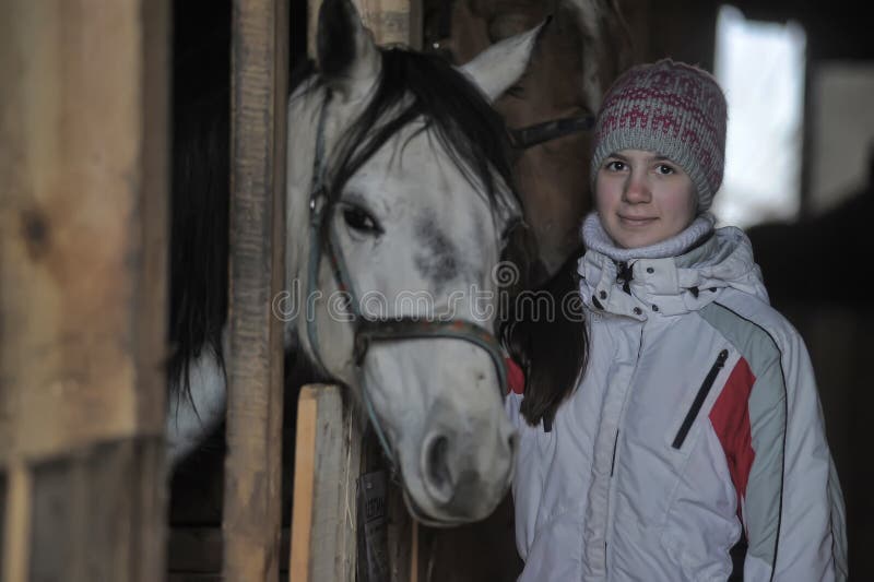Girl with a horse stabled stock image. Image of female - 44872901