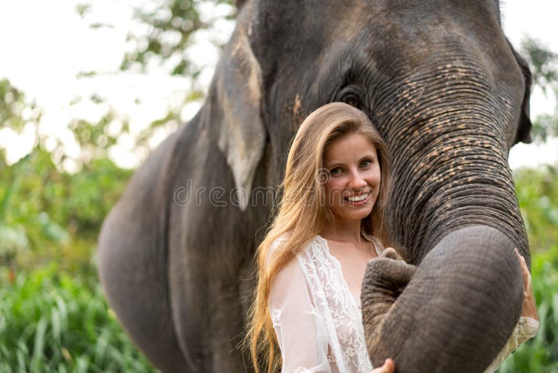 Girl Hugging an Elephant in the Jungle Stock Image - Image of laos ...