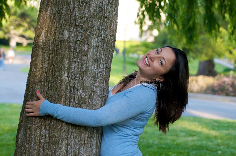 Girl hugging tree stock photo. Image of foreign, campus - 9267602