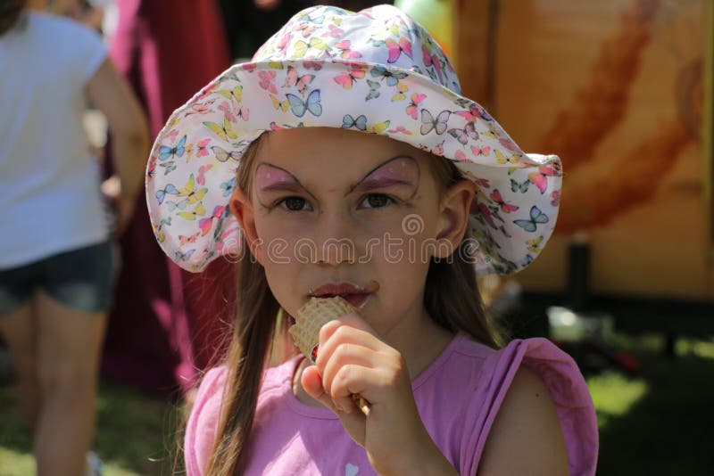 Girl with Ice Cream on the Walk. Stock Photo - Image of portrait, girl ...