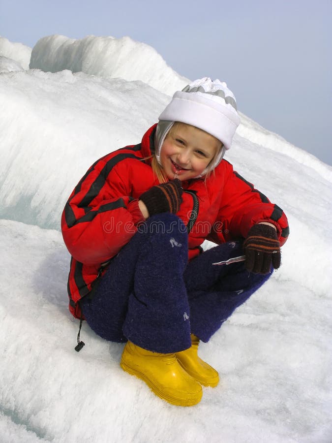 Girl with icicle stock photo. Image of pack, young, jacket - 205892