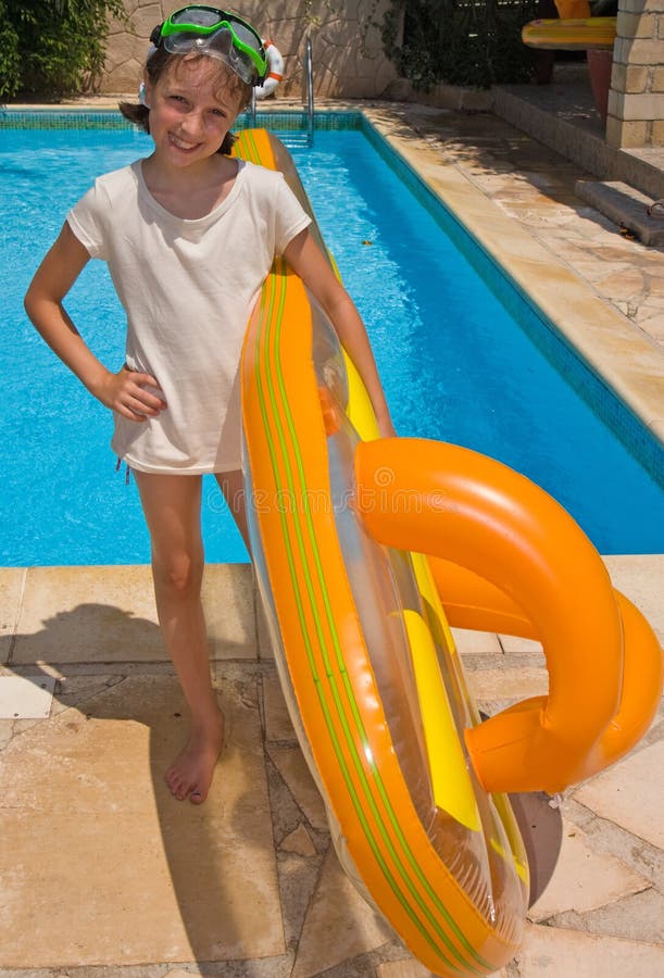 Girl with Inflatable by the Pool Stock Image - Image of float, teen ...