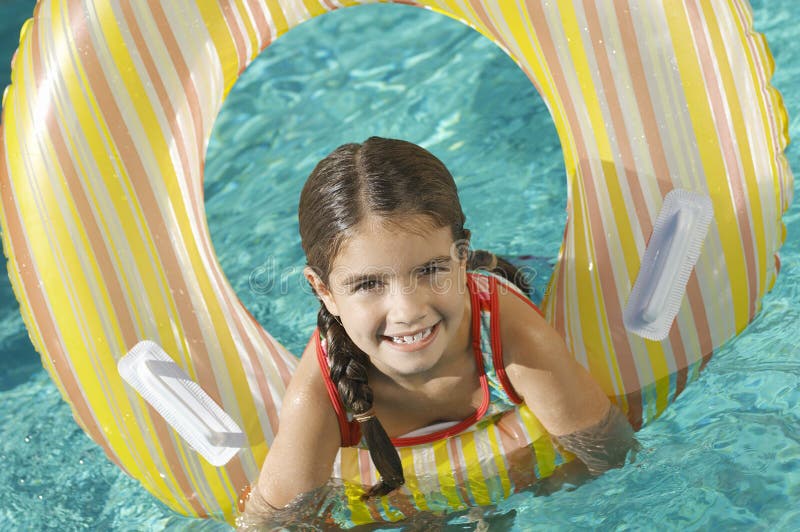 Girl with Inflatable Ring in Swimming Pool Stock Image - Image of ...