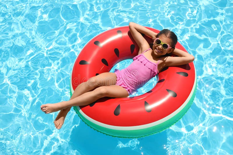 Girl on Inflatable Ring in Swimming Pool. Summer Stock Image - Image of ...