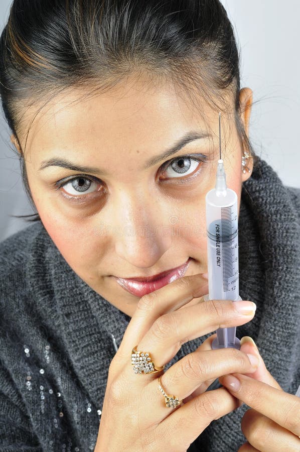 Girl with injection stock image. Image of clothes, rings - 12775579