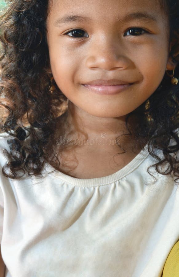 Girl with innocent smile stock photo. Image of concept - 22659400