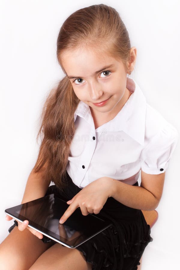 Girl with ipad like gadget stock image. Image of education - 29709407
