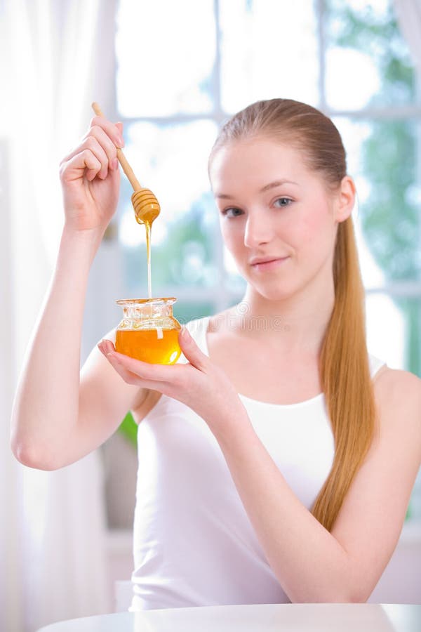 Girl with jar of honey stock photo. Image of abstract - 10979434