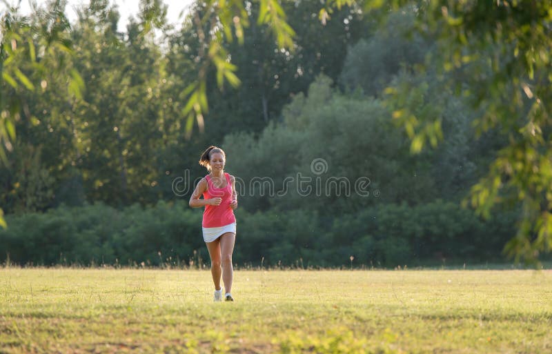 Girl jogging in nature stock image. Image of action, exercising - 32949799