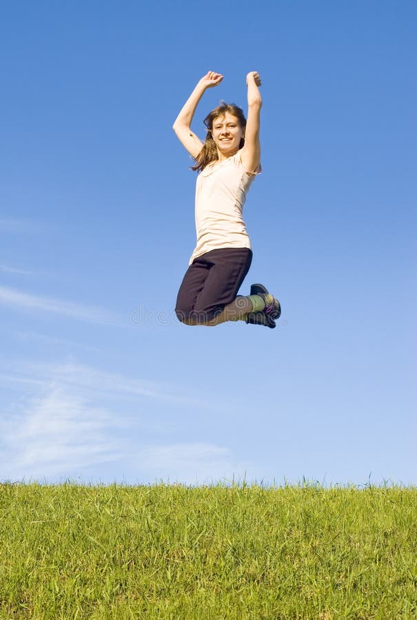 Girl in a jump stock photo. Image of high, light, summer - 14451538