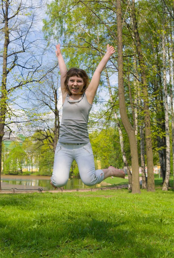 The girl in a jump stock photo. Image of beauty, motion - 23346752