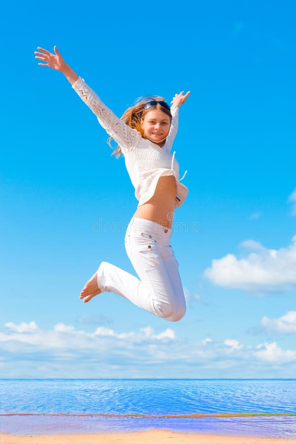 Girl jumping stock image. Image of beach, beauty, legs - 10012727