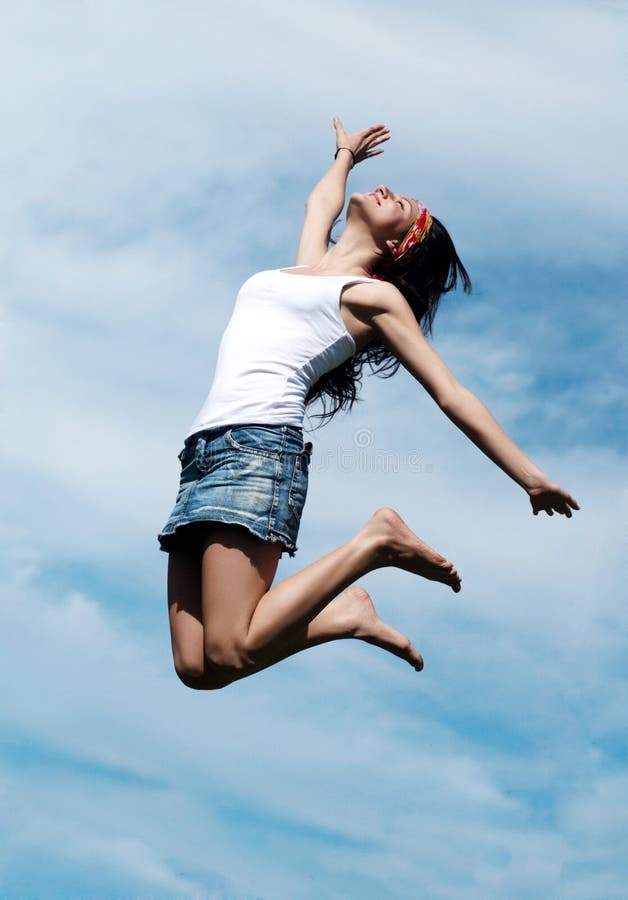 Girl jumping stock photo. Image of girl, elation, leap - 12331410