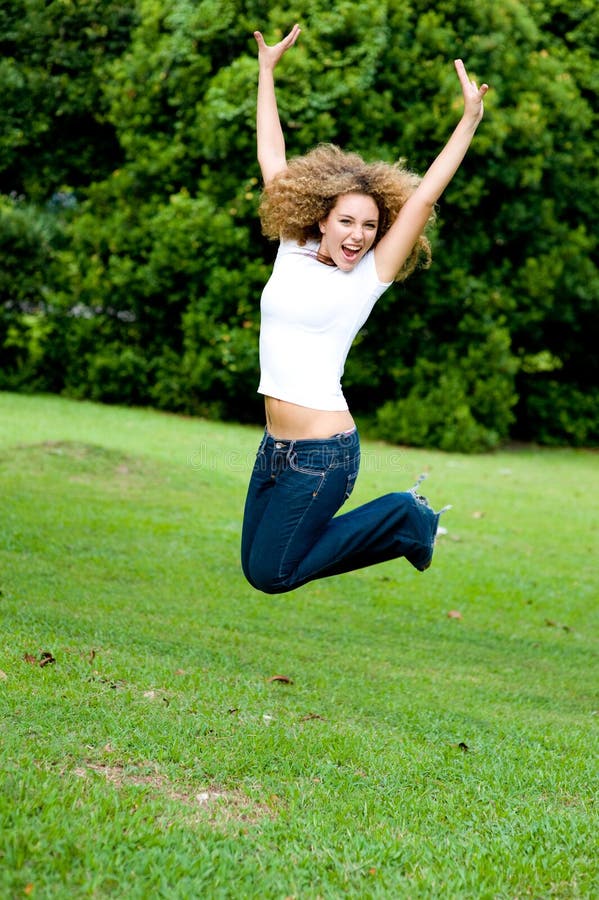 Girl Jumping stock photo. Image of hair, jumping, beauty - 4957880