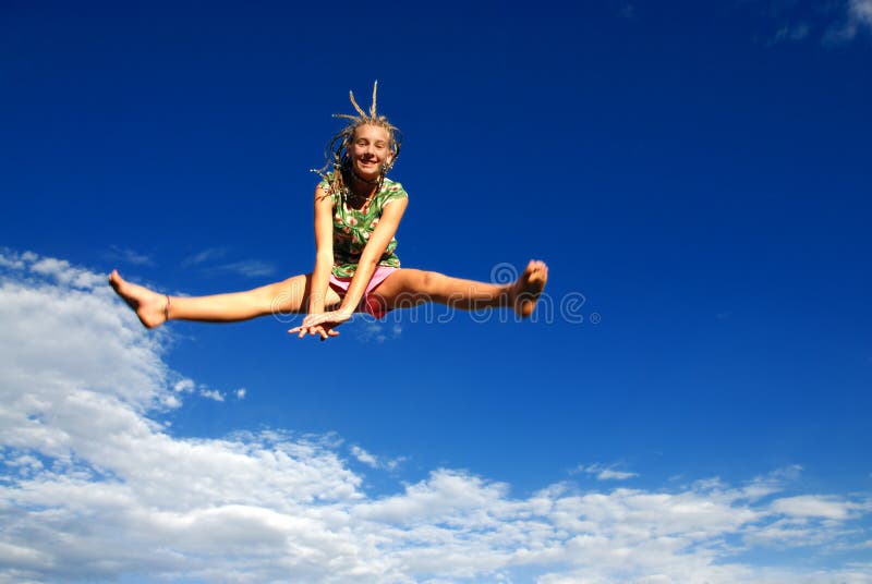 Girl jumping high in air stock image. Image of exaltation - 3541763